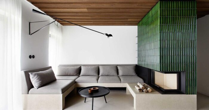 Tube-Shaped Tiles Surround The Fireplace Inside This Home - ᐅ ...